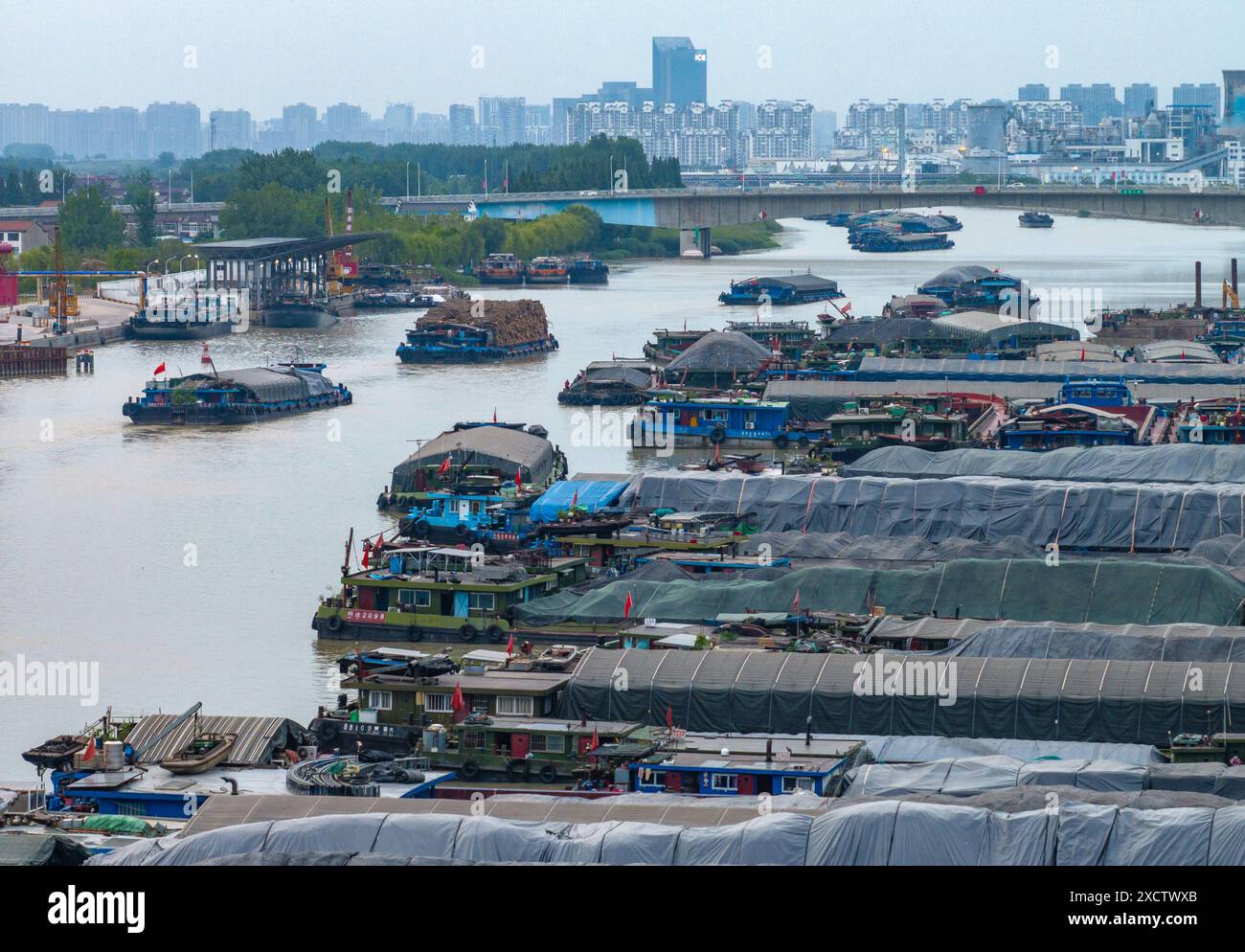 HUAI'AN, CHINA - JUNE 18, 2024 - Ships are stranded at the upper ...