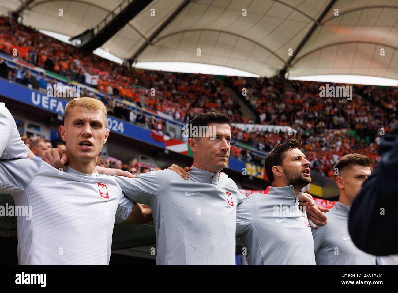 Damian Szymanski, Robert Lewandowski, Bartosz Bereszynski (Poland) sing ...