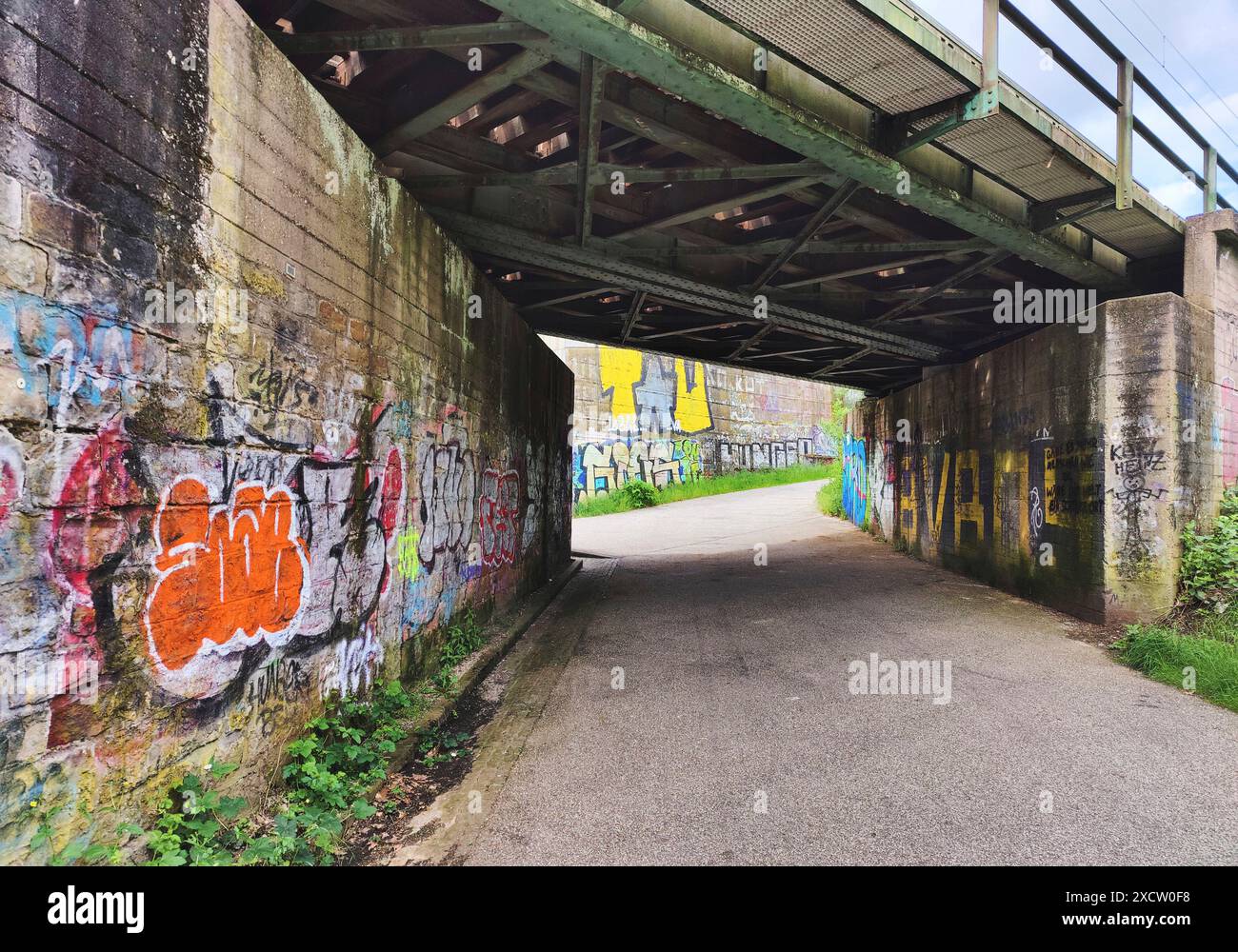 bridge underpass with graffiti in Phoenix Park, path to the Hympendahl ...