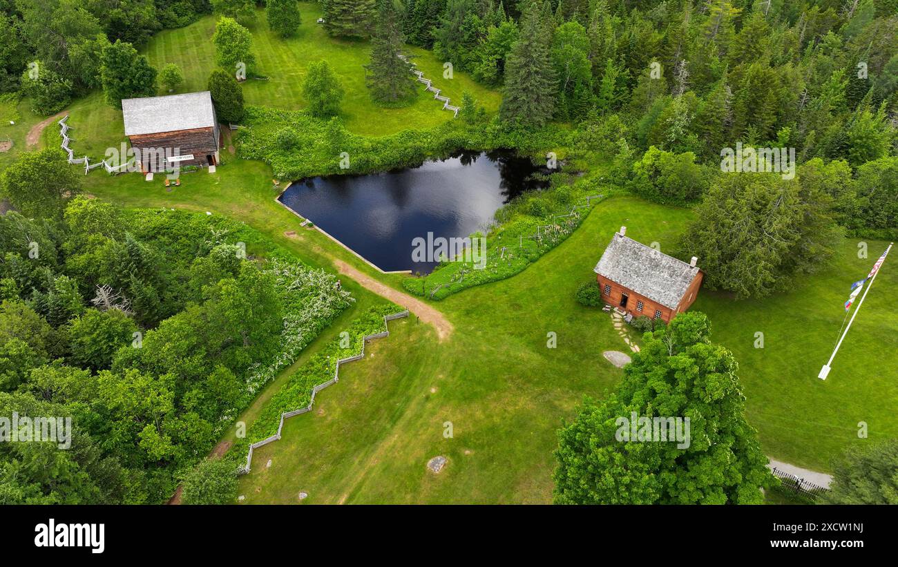 Aerial view of house and barn on John Brown Farm State Historic Site in ...