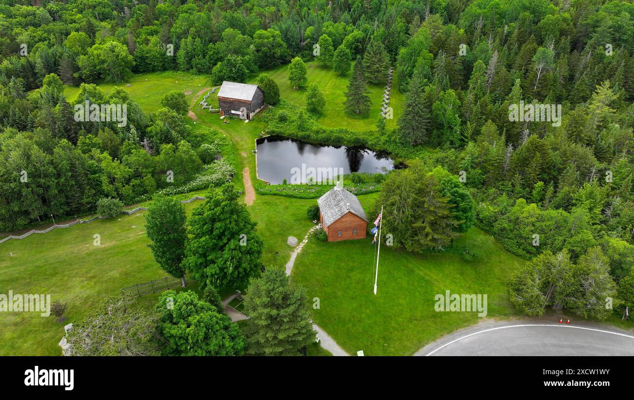 Aerial view of house and barn on John Brown Farm State Historic Site in ...