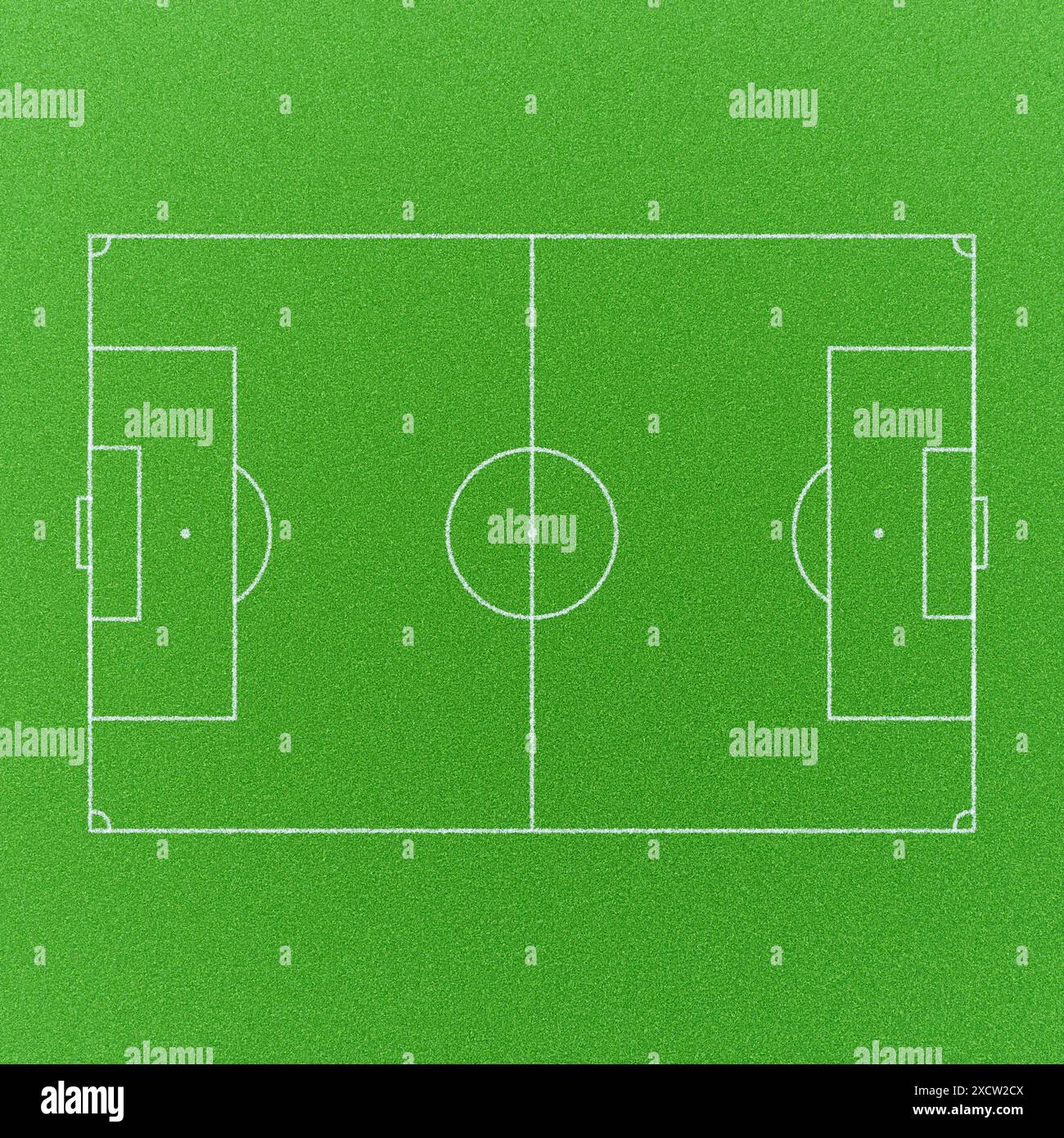 A soccer pitch with green grass and chalk markings from above with copy ...