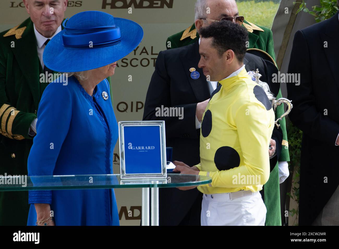 Ascot, UK. 18th June, 2024. The Queen makes the winners presentation ...