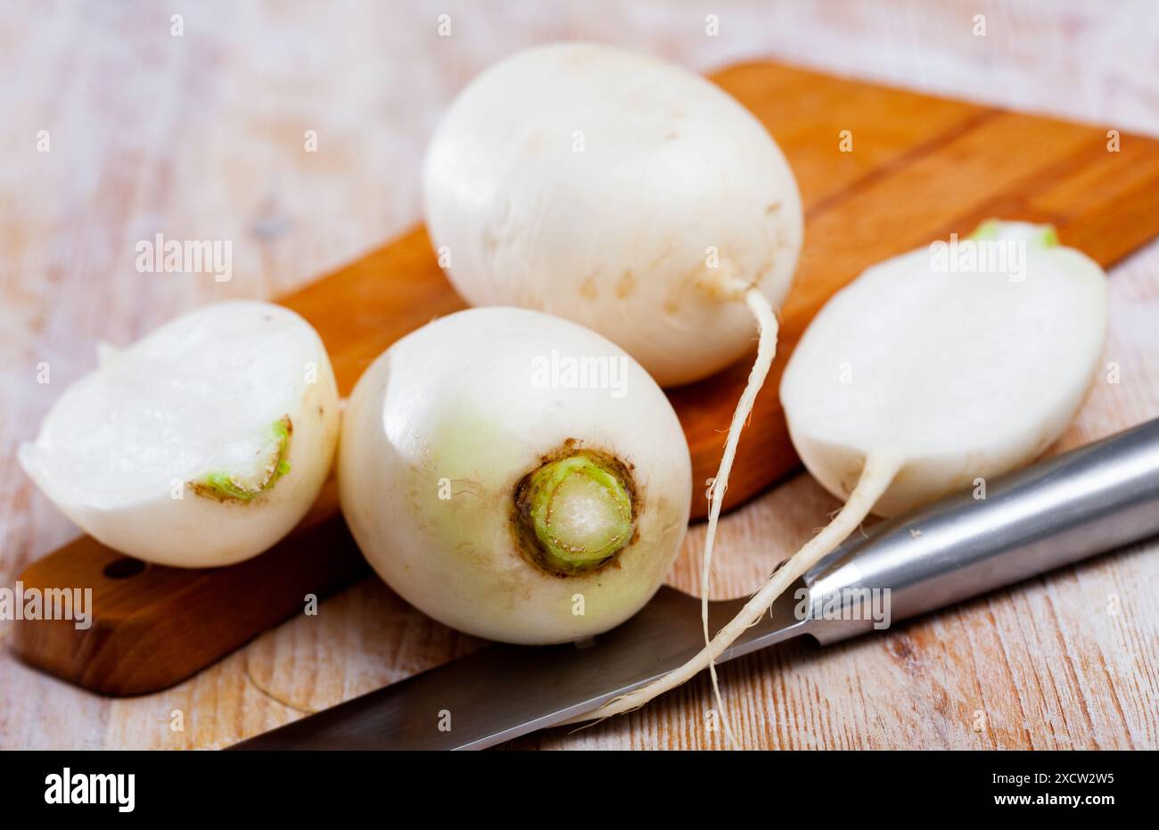 Whole and sliced white turnips Stock Photo - Alamy