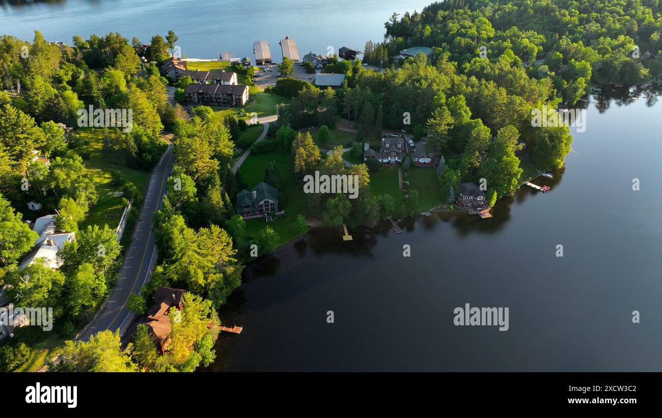 Aerial view of Mirror Lake, Lake Placid and the strip of land in ...