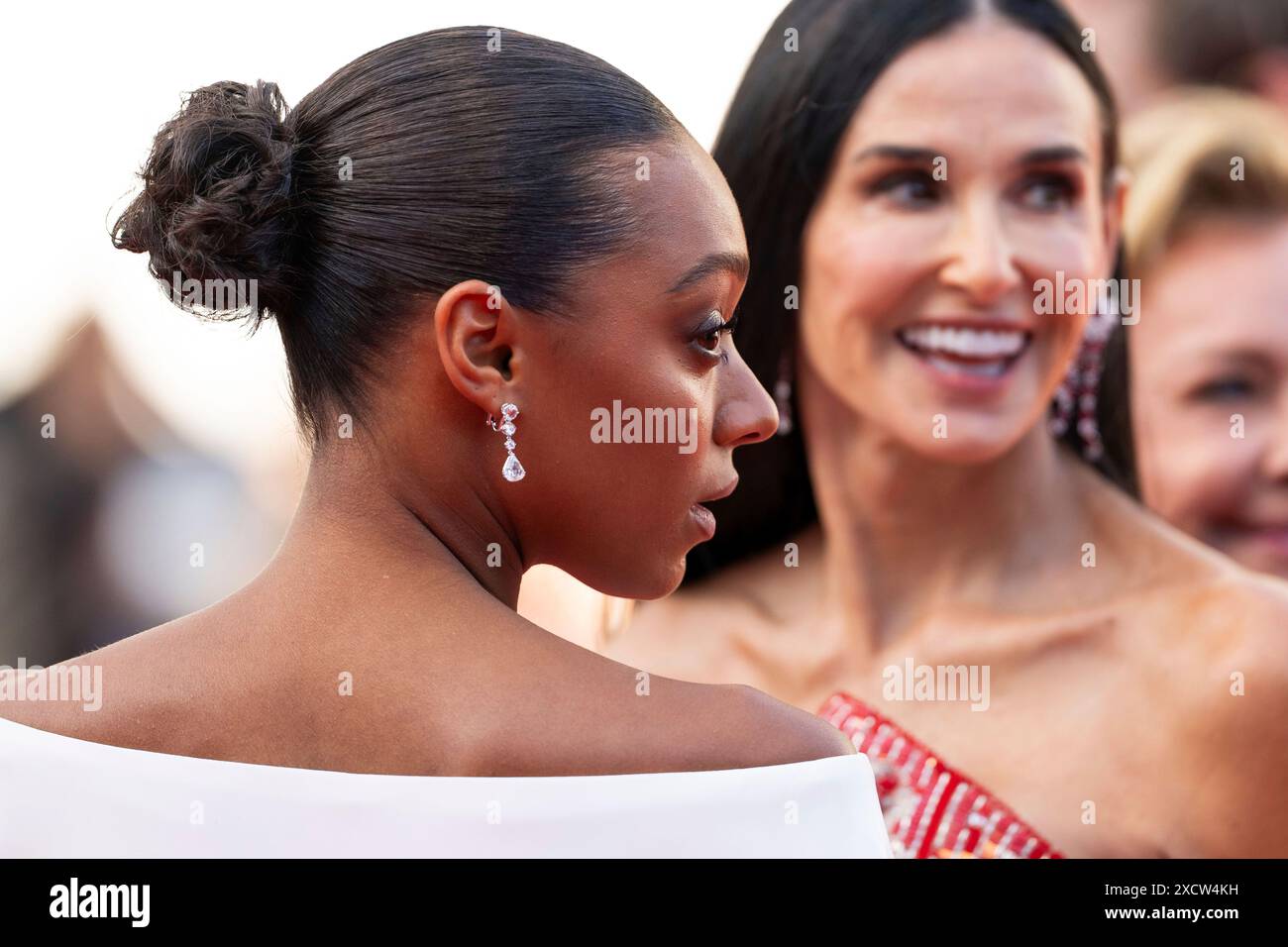 Sophie Wilde, left, and Demi Moore pose for photographers upon arrival ...