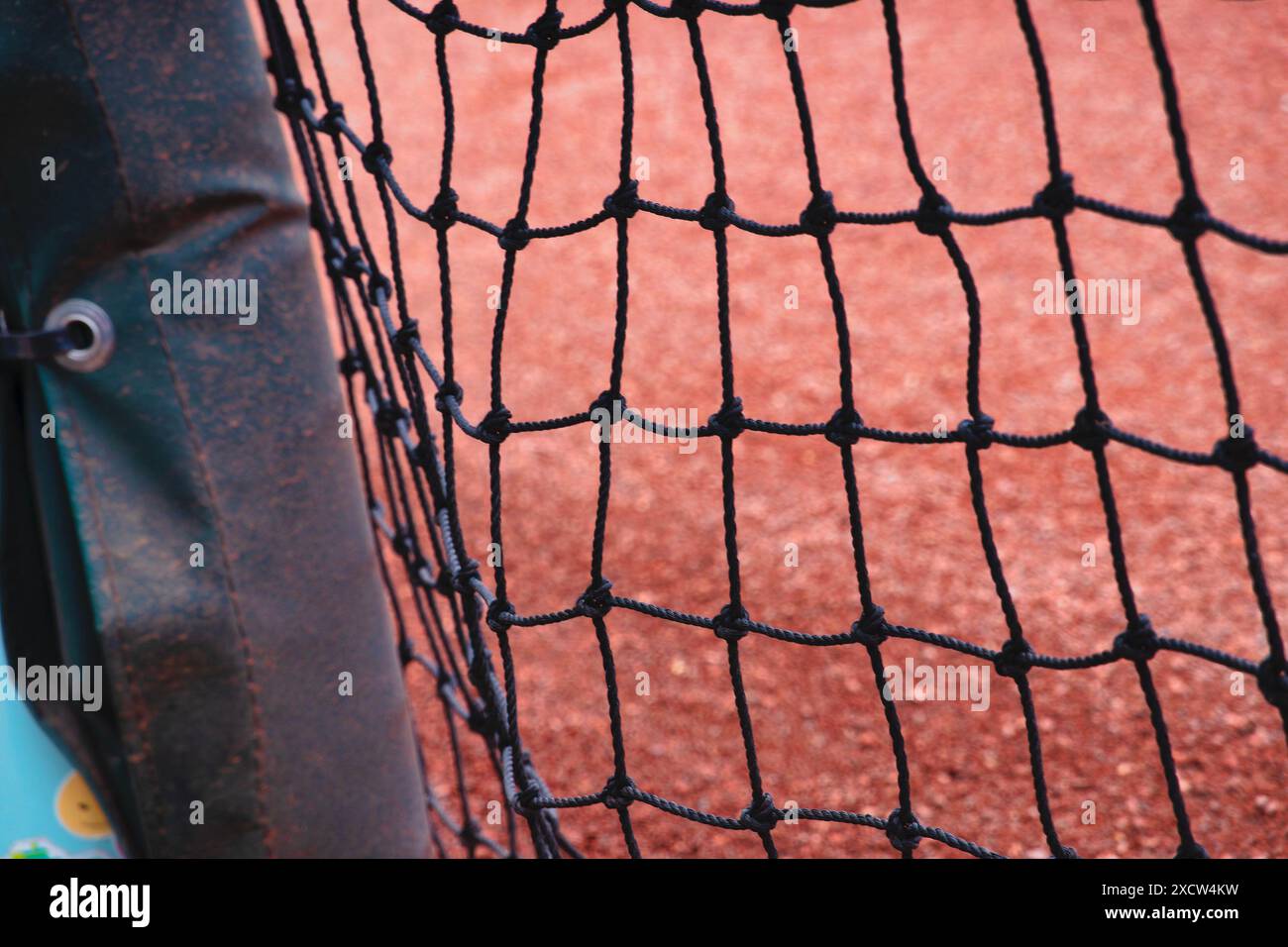 Protective netting in the dugout area of a baseball stadium Stock Photo ...