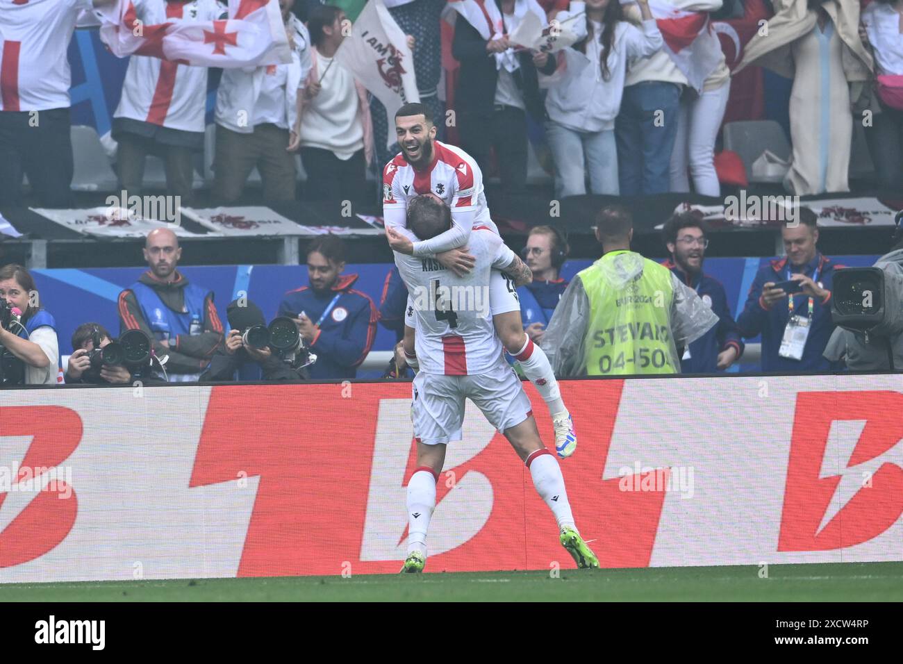 Georges Mikautadze (Georgia)Guram Kashia (Georgia) celebrates after ...