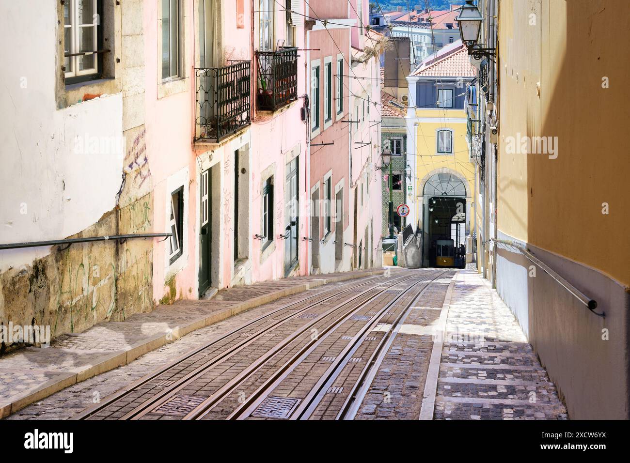 view from halfway down to the valley station of the Elevador da Bica ...