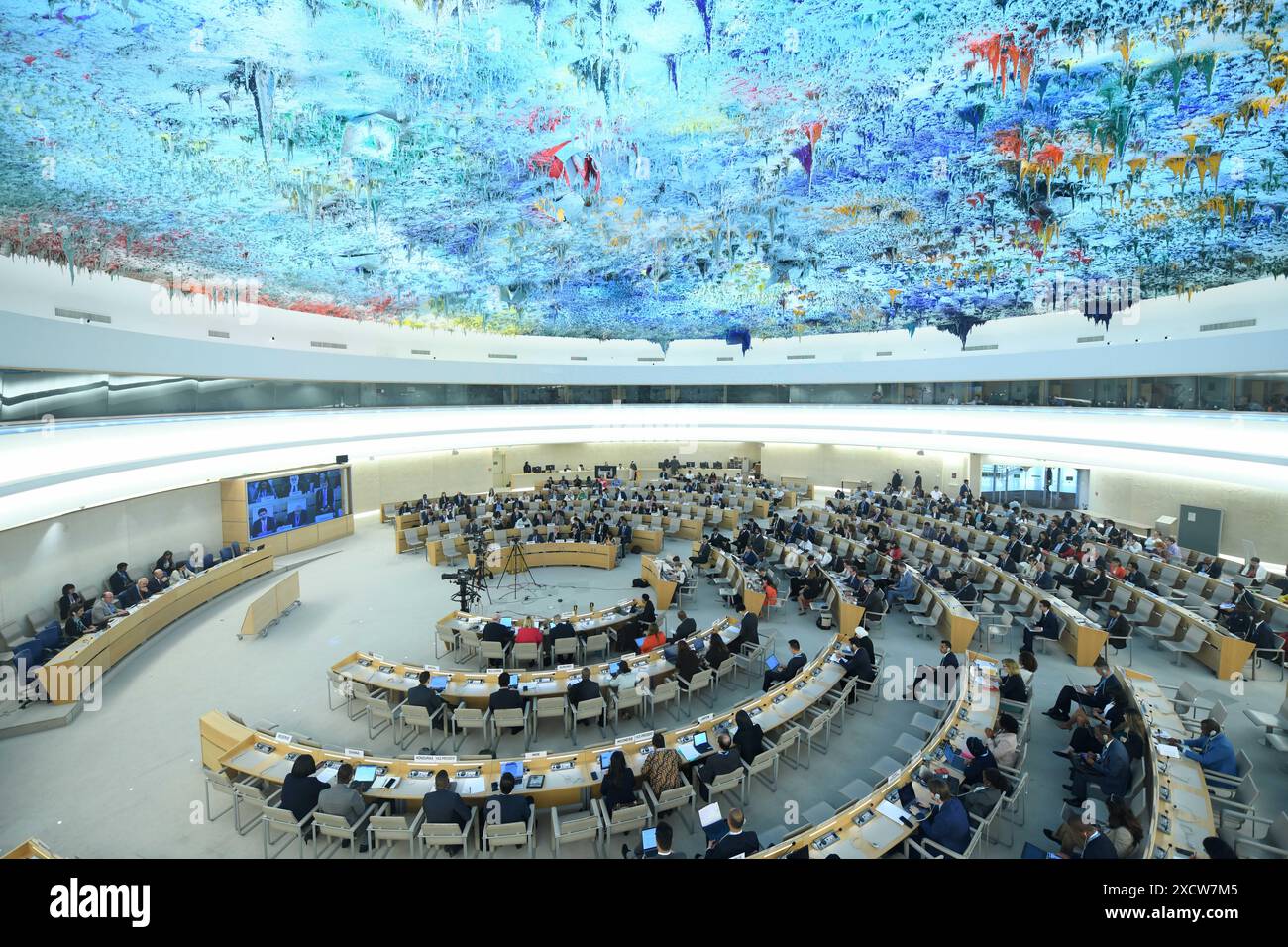 Geneva, Switzerland. 18th June, 2024. Delegates attend a meeting of the ...