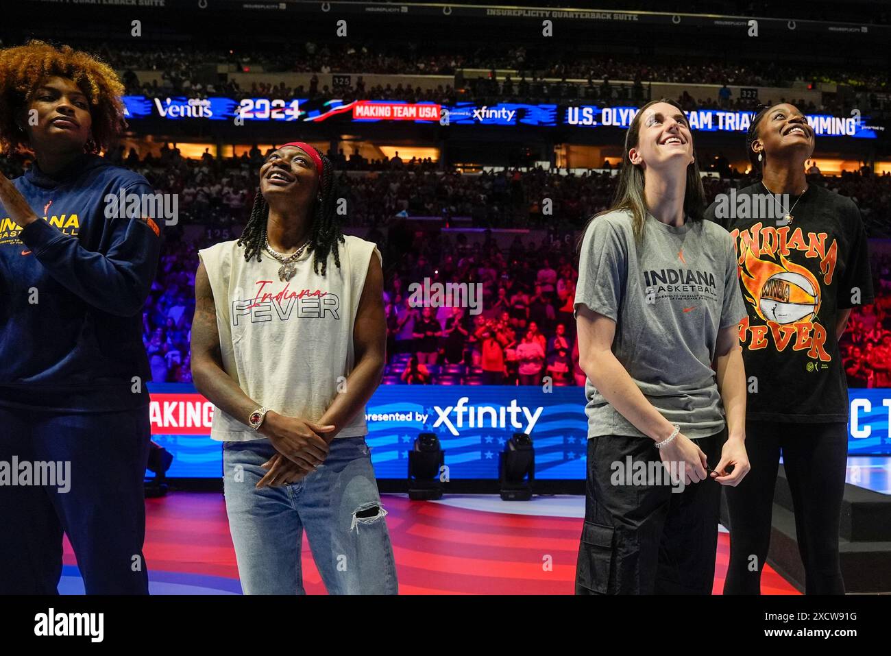 Members of the WNBA Indiana Fever team including Caitlin Clark are ...