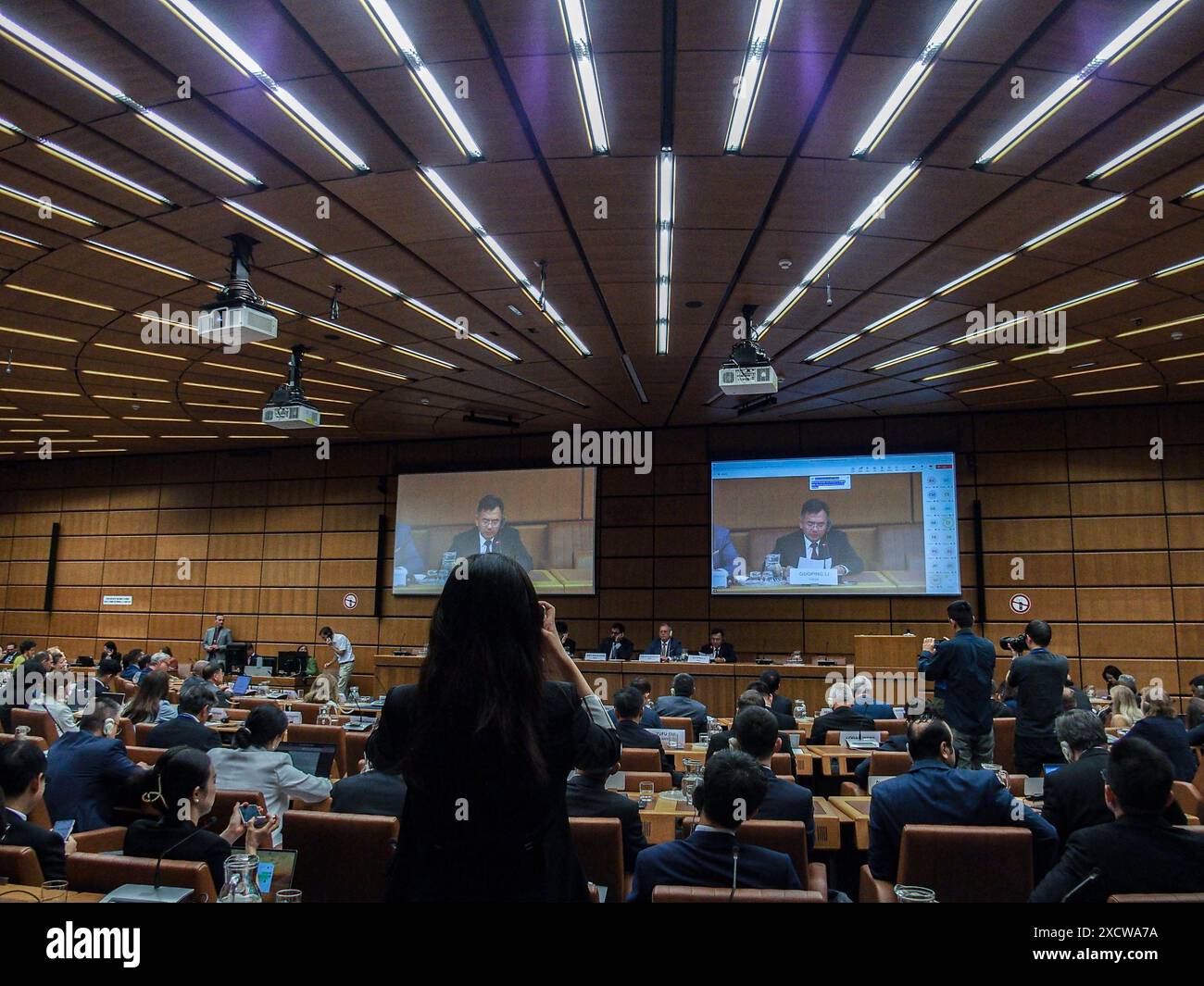 Vienna, Austria, Austria. 18th June, 2024. GUOPING LI of CNSA speaks at ...