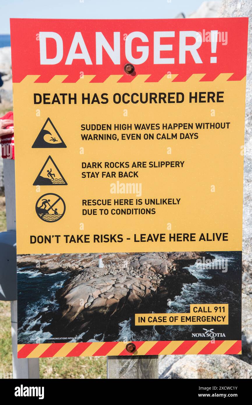 Danger sign in Peggy's Cove, Nova Scotia, Canada Stock Photo - Alamy