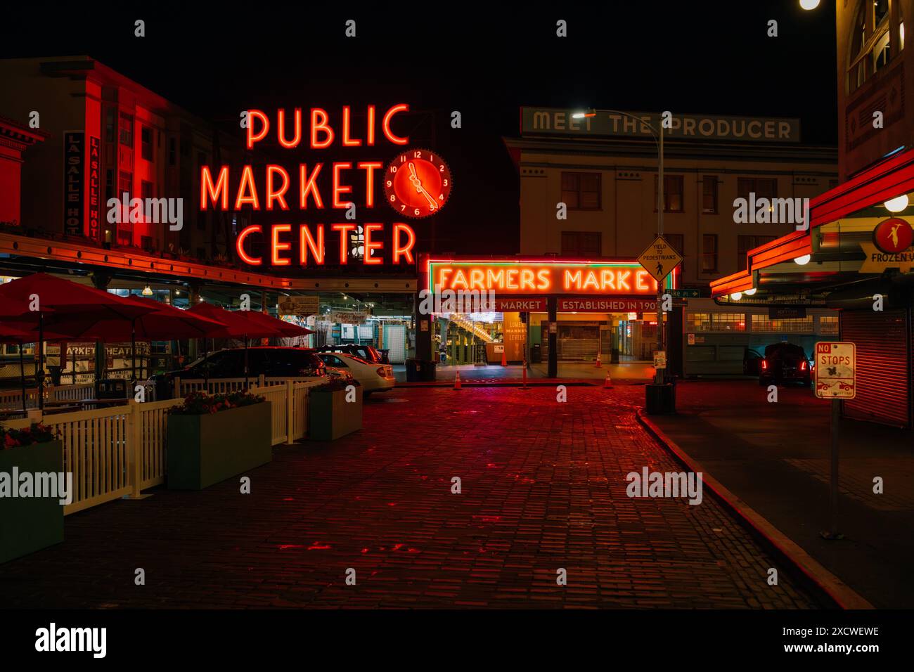 red neon Public Market Center sign at night, empty Pike Place Market in ...