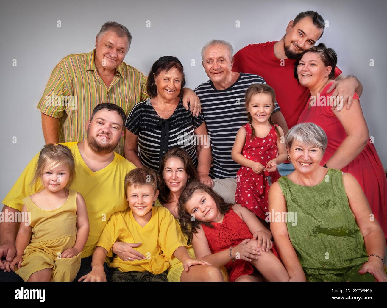Portrait of a large family together on the sofa. 4 generations Stock ...