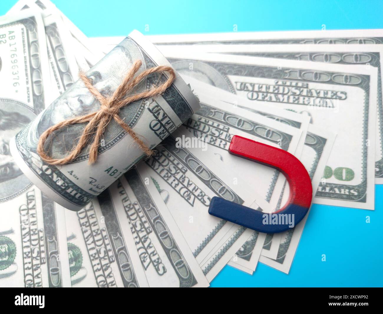 Dollar banknotes money and red blue magnet. Money laundering Stock ...