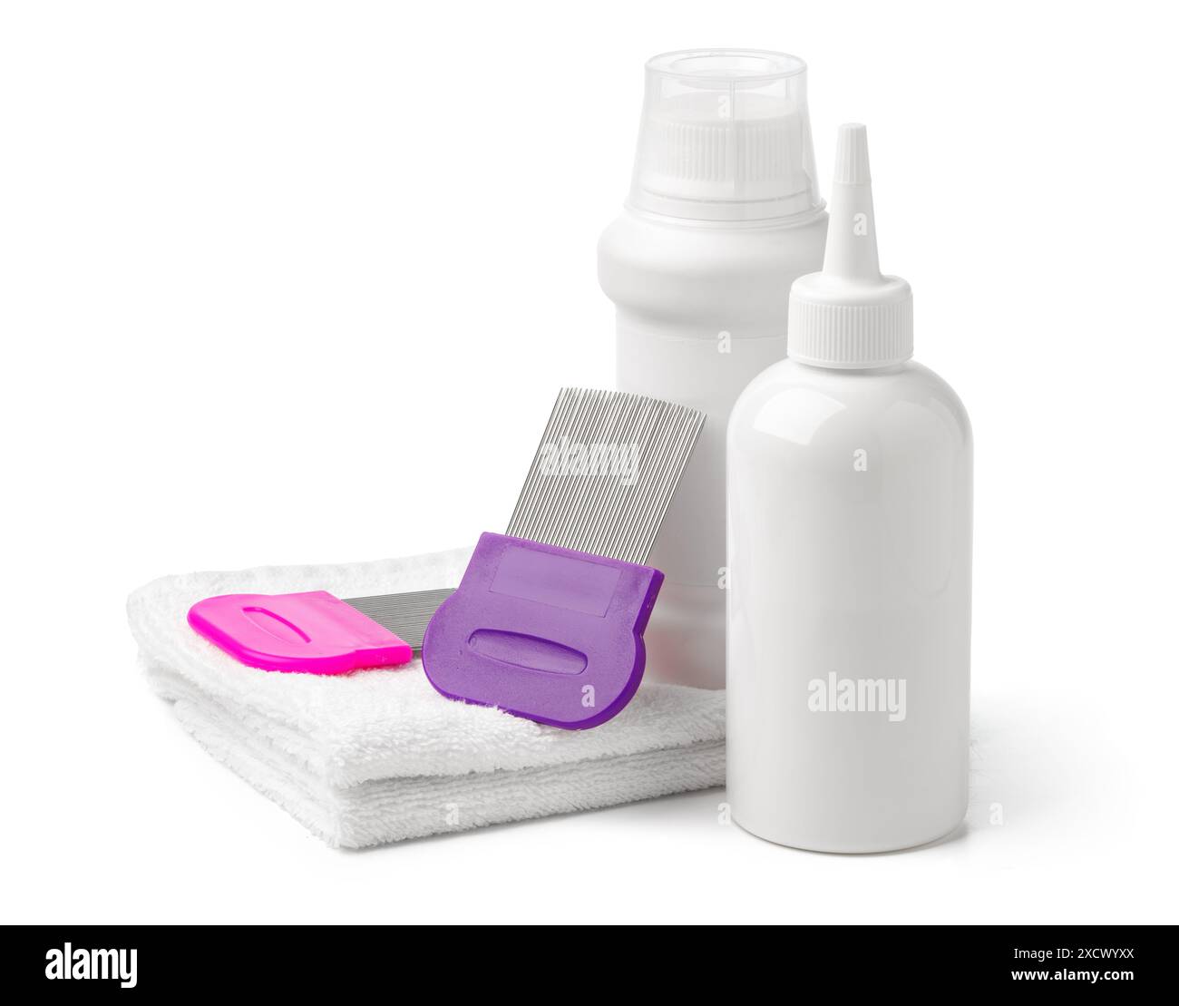 Comb, anti lice medicine and towel on white background Stock Photo - Alamy