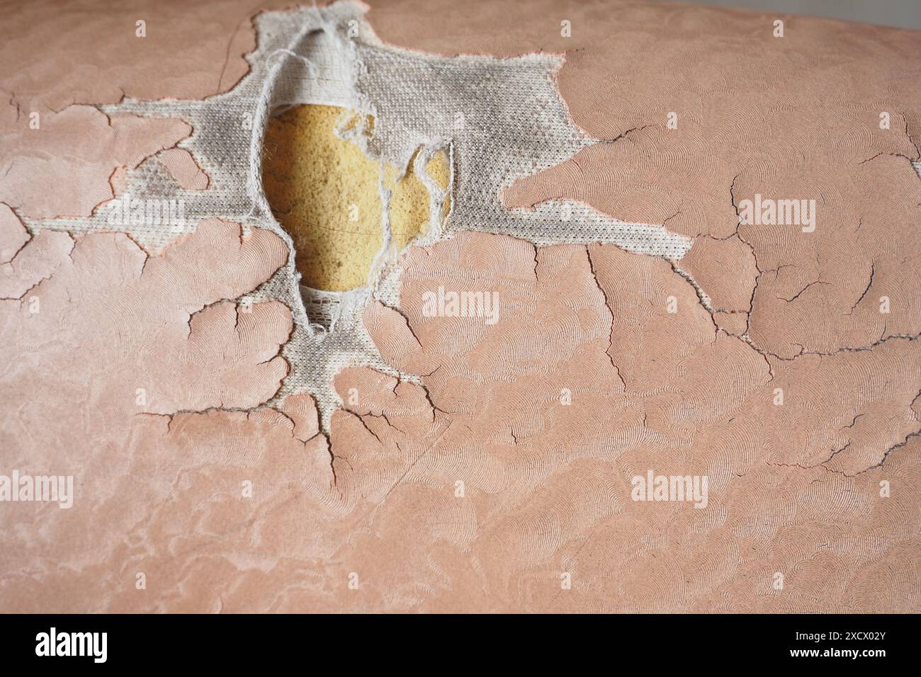 damage Leather with a cracked texture on a sofa Stock Photo - Alamy