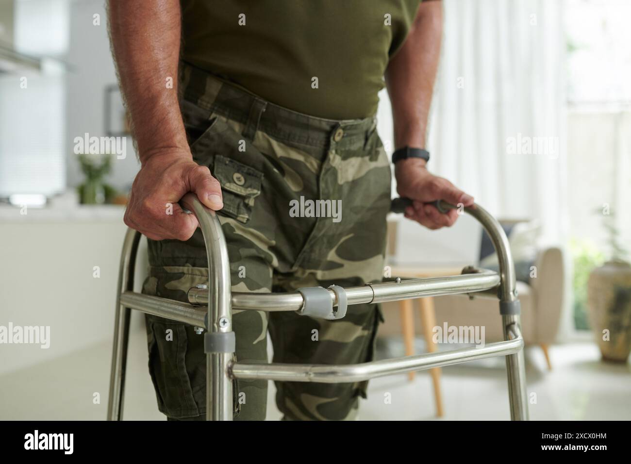 Soldier in Uniform Using Walk Helper Stock Photo - Alamy
