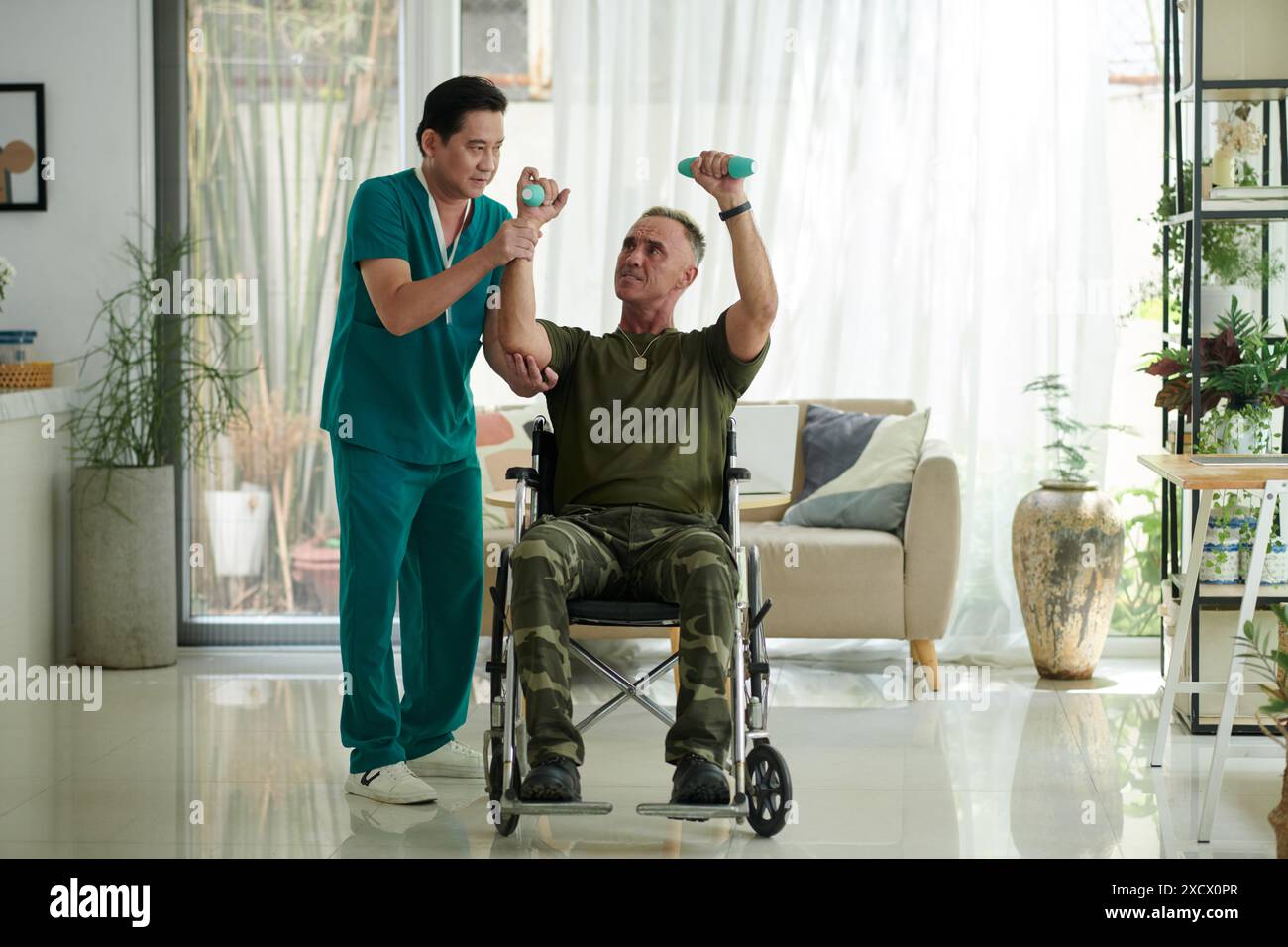 Soldier With Disability Training With Doctor Stock Photo - Alamy