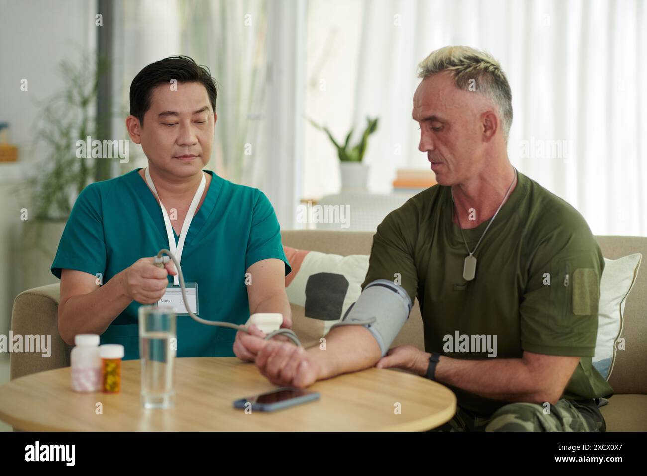 Soldier Checking His Blood Pressure Stock Photo - Alamy