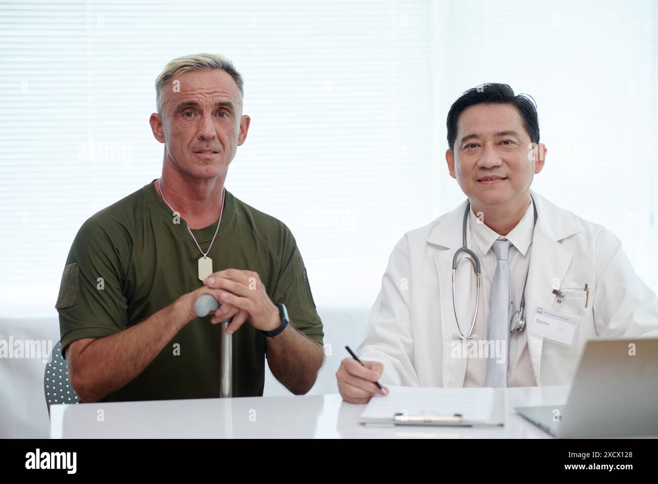 Soldier And Doctor At Hospital Stock Photo - Alamy