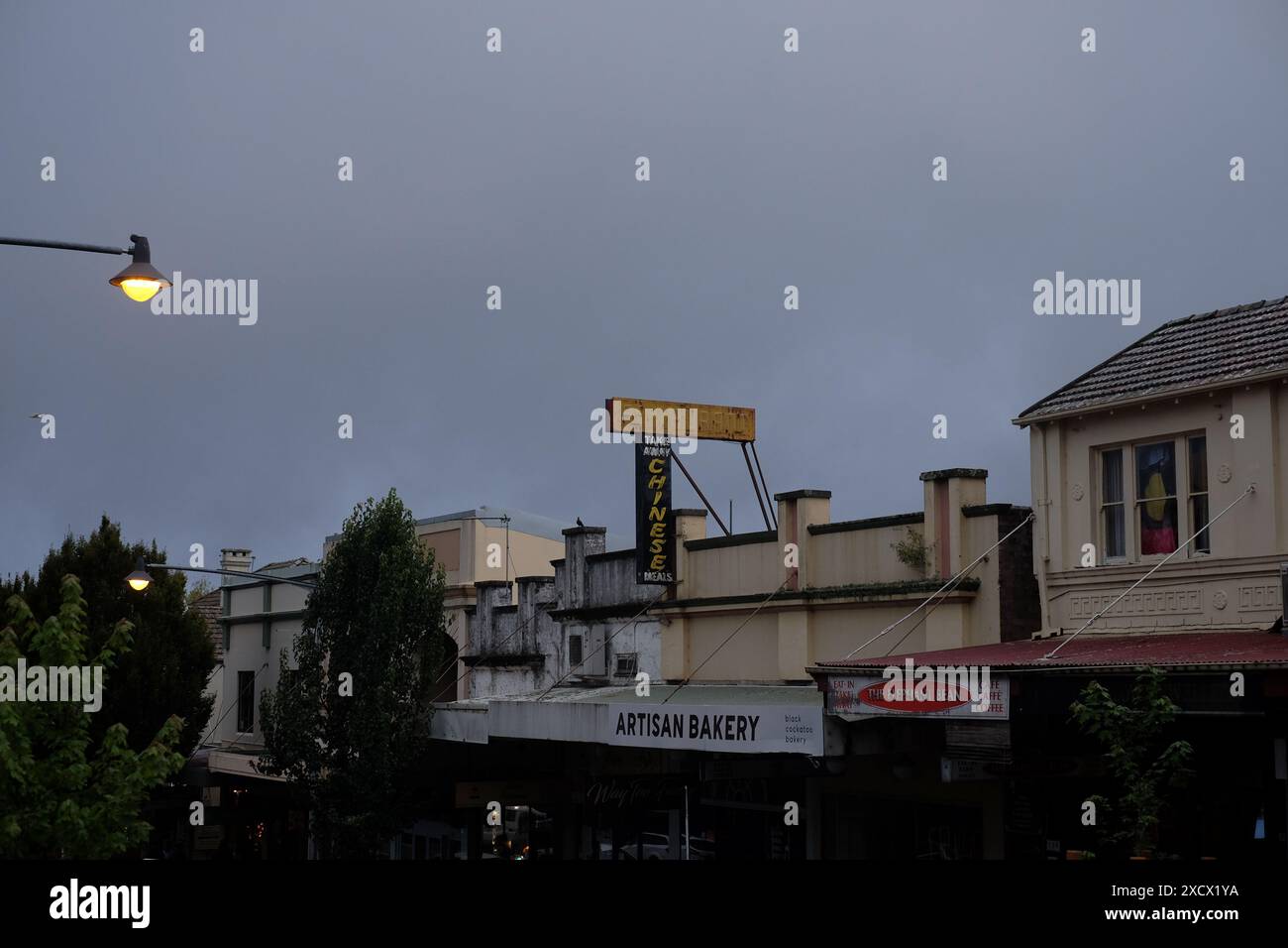 Roofline of shop awnings, signs, along Katoomba Street, an artisan ...