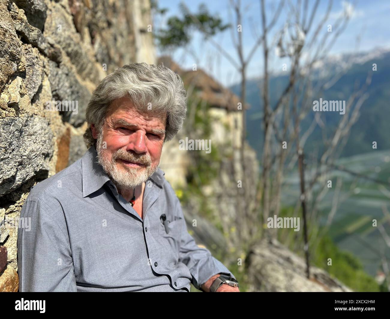 Juval, Italy. 18th June, 2024. Mountaineer Reinhold Messner sits on a ...
