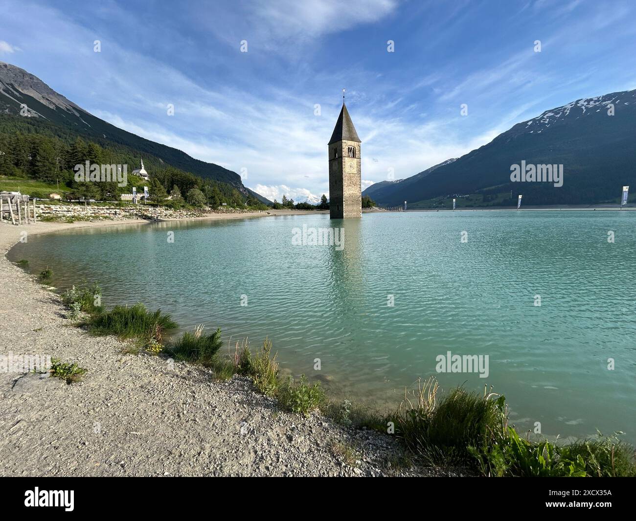 Altgraun, Italy. 18th June, 2024. The tower of the sunken church of ...