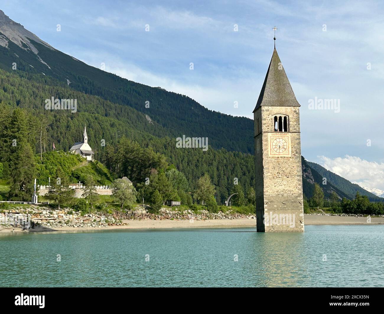 Altgraun, Italy. 18th June, 2024. The tower of the sunken church of ...