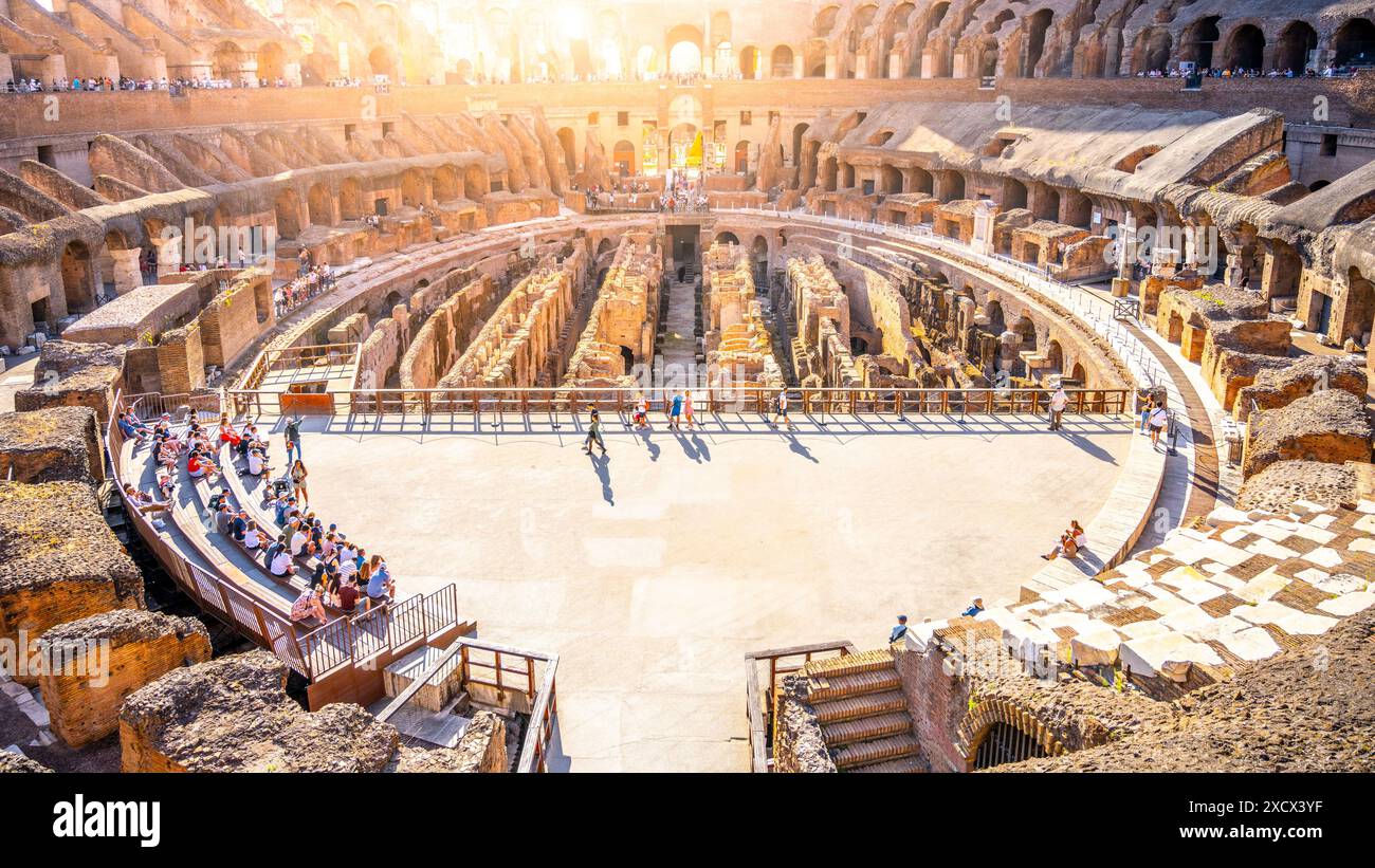 A panoramic view of the Colosseum in Rome, Italy, as the sun sets ...