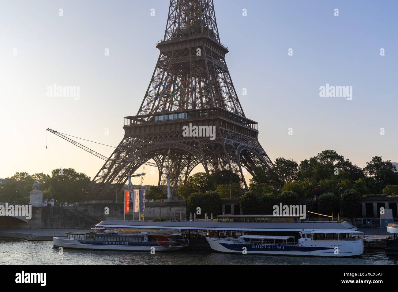 Paris, France - June 07 2024: Eiffel tower in early morning light ...