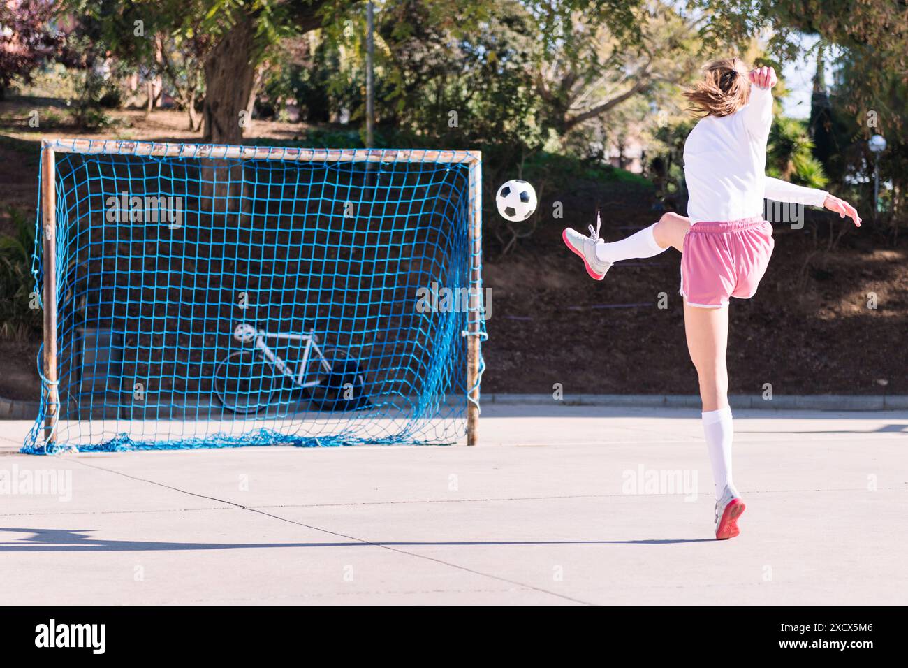 Football kicking a goal woman hi-res stock photography and images - Alamy