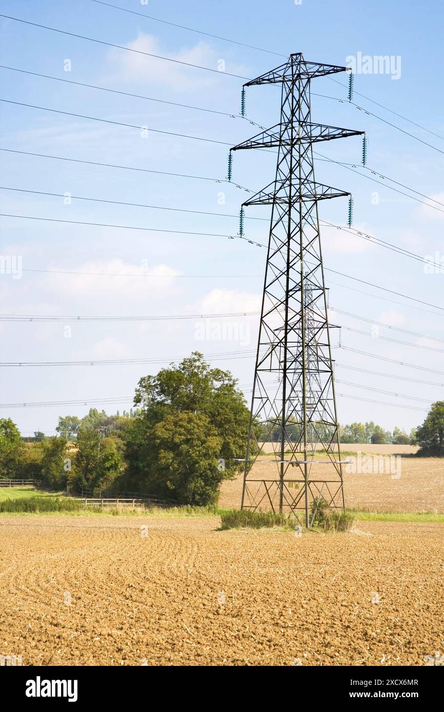 electrical power distribution pylons crossing farmland in hertfordshire ...