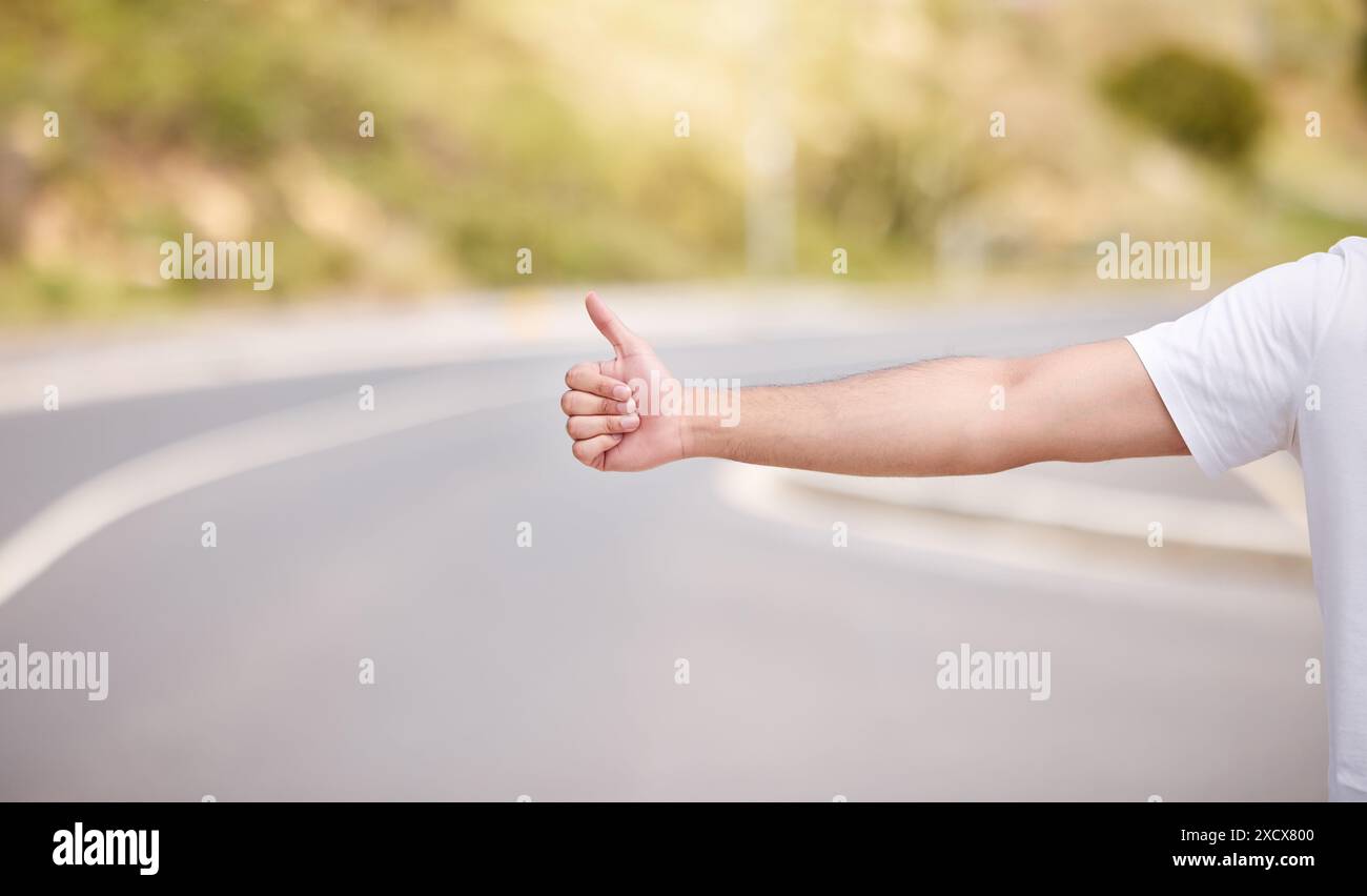 Thumbs up, travel and person hitch hiking on road trip for adventure ...