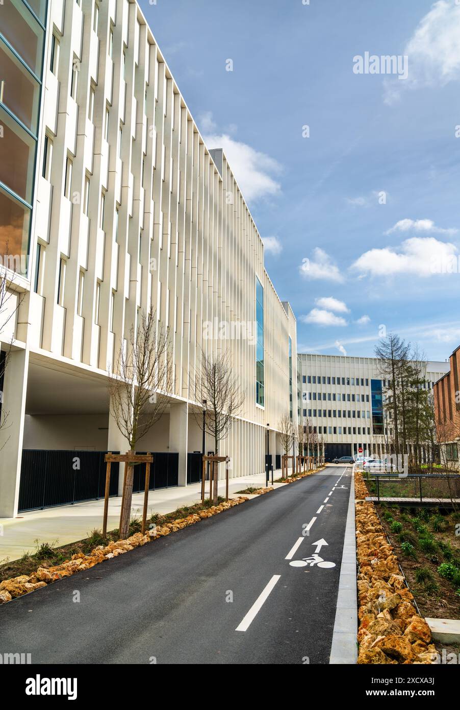 Bike path at modern campus of Paris-Saclay Research University in ...