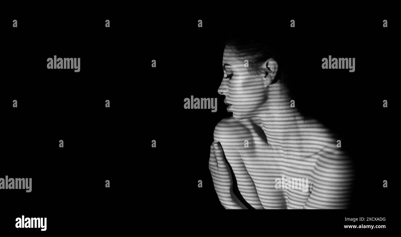 Woman Posing With Horizontal Stripes Projected on Her Body Stock Photo ...