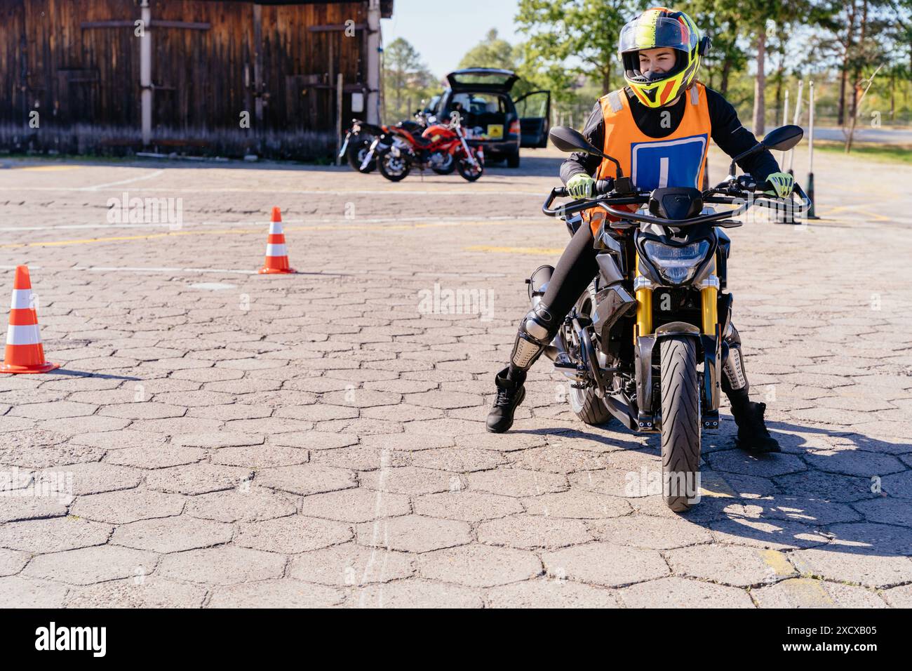 Spotted a rider on a motorcycle displaying the number 1 Stock Photo - Alamy