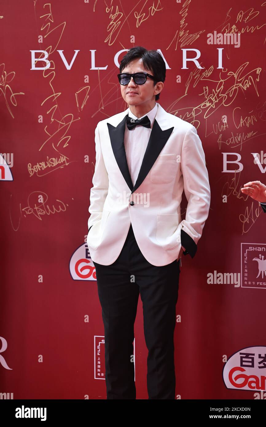 Chinese actor Deng chao poses for a photo on the red carpet at the ...