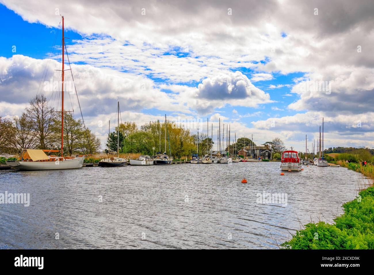 Assorted boats and yachts on the Exeter Canal at Turf Lock where it ...