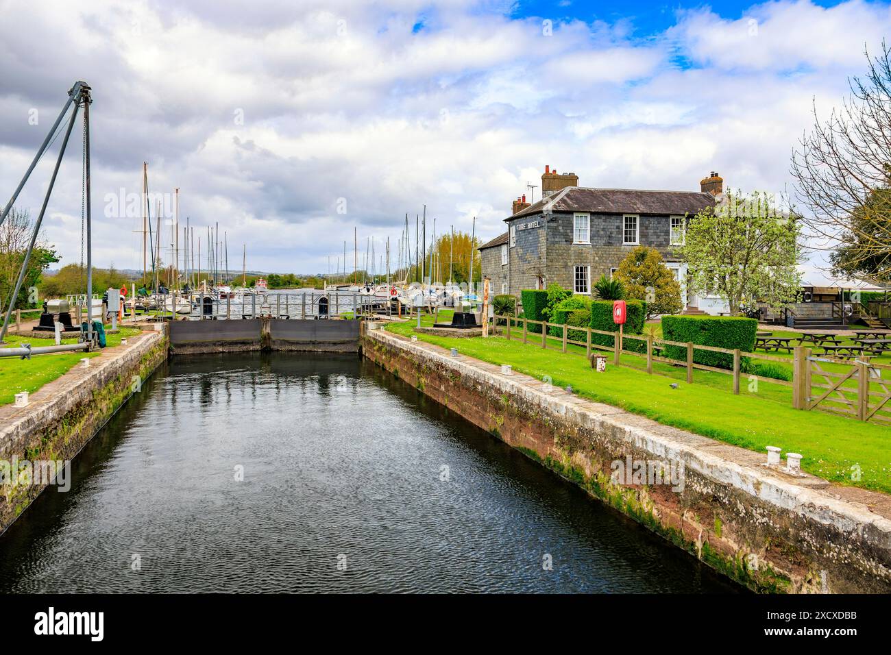 Assorted boats and yachts on the Exeter Canal at Turf Lock where it ...