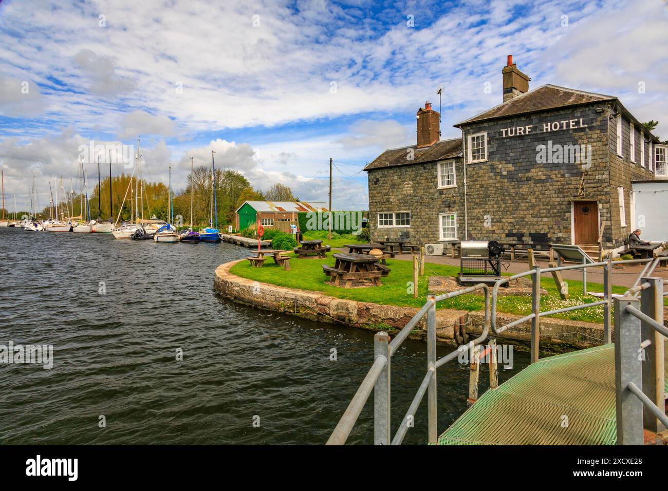 Assorted boats and yachts on the Exeter Canal at Turf Lock where it ...