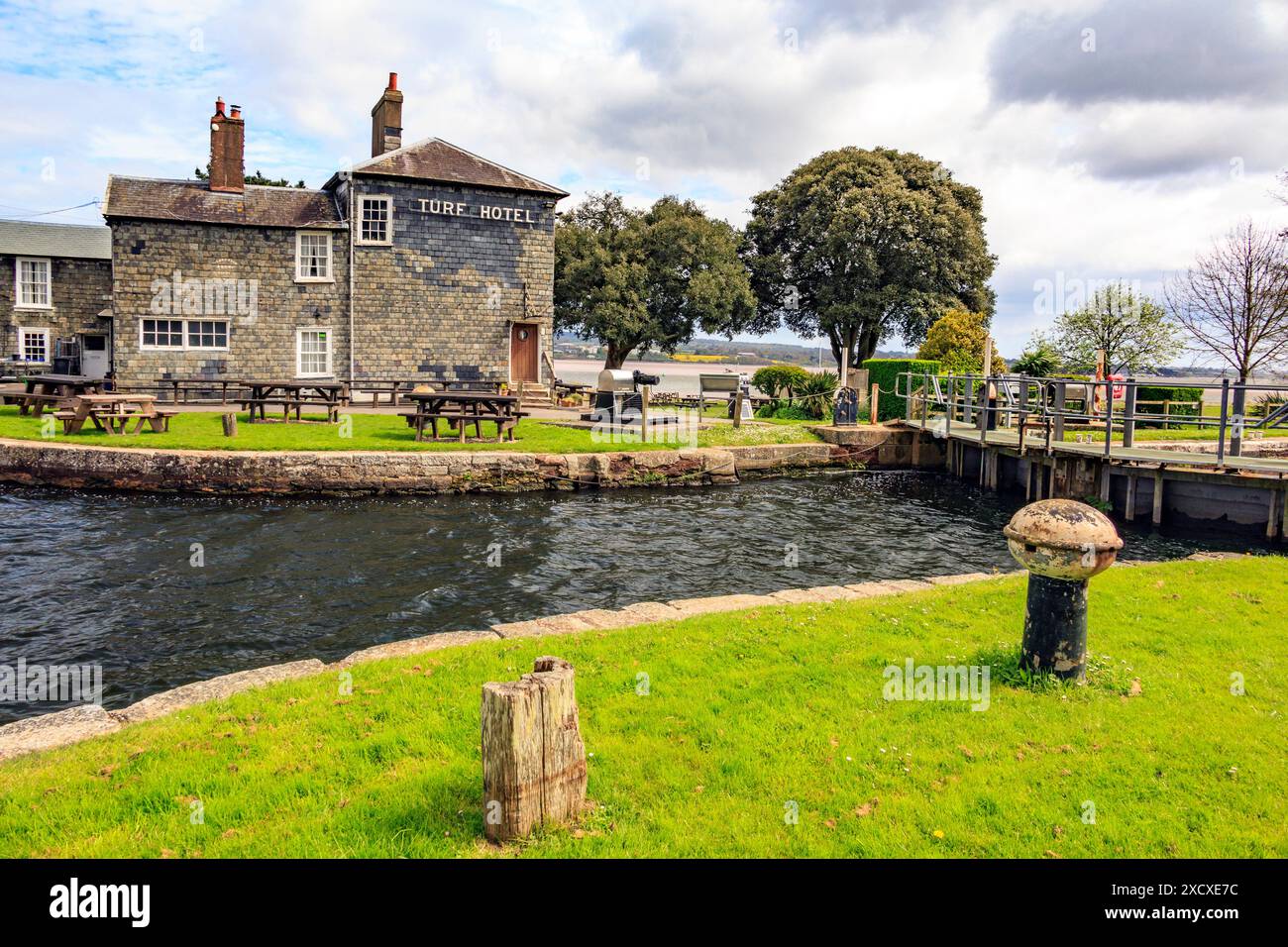 The Exeter Canal at Turf Lock and the Turf Hotel where it connects with ...