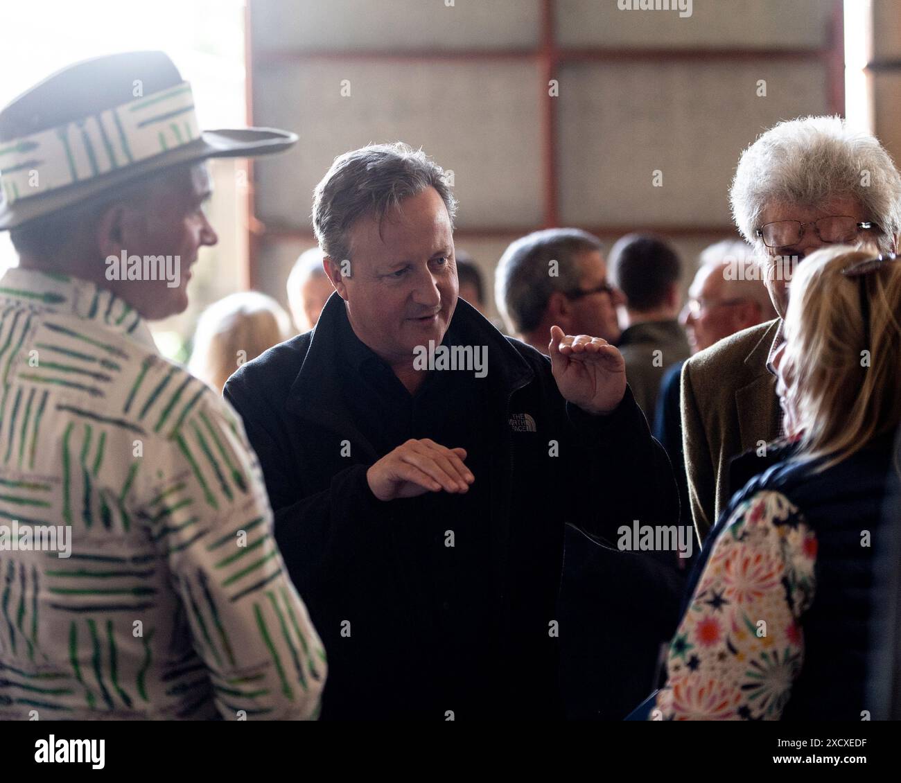Lord Cameron chatting to farmers in Devon Stock Photo - Alamy