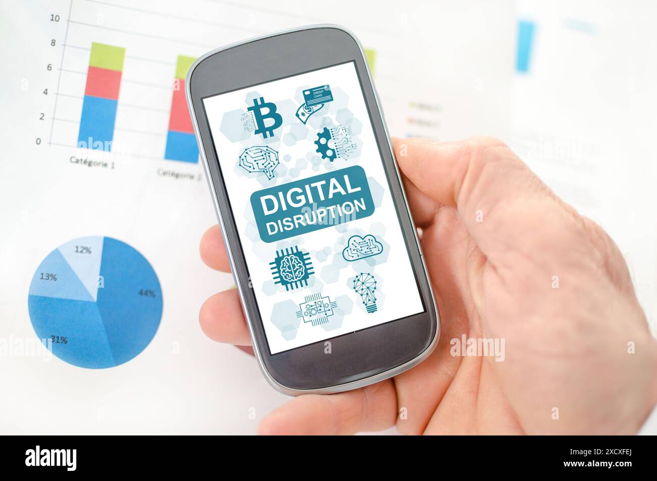 Digital disruption concept on a smartphone held by a hand Stock Photo ...