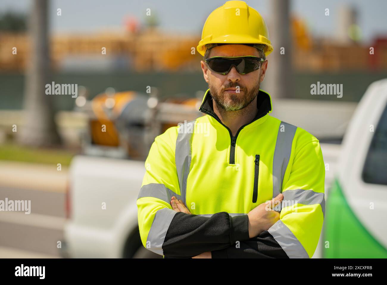 Construction man with helmet. Worker at construction new building ...