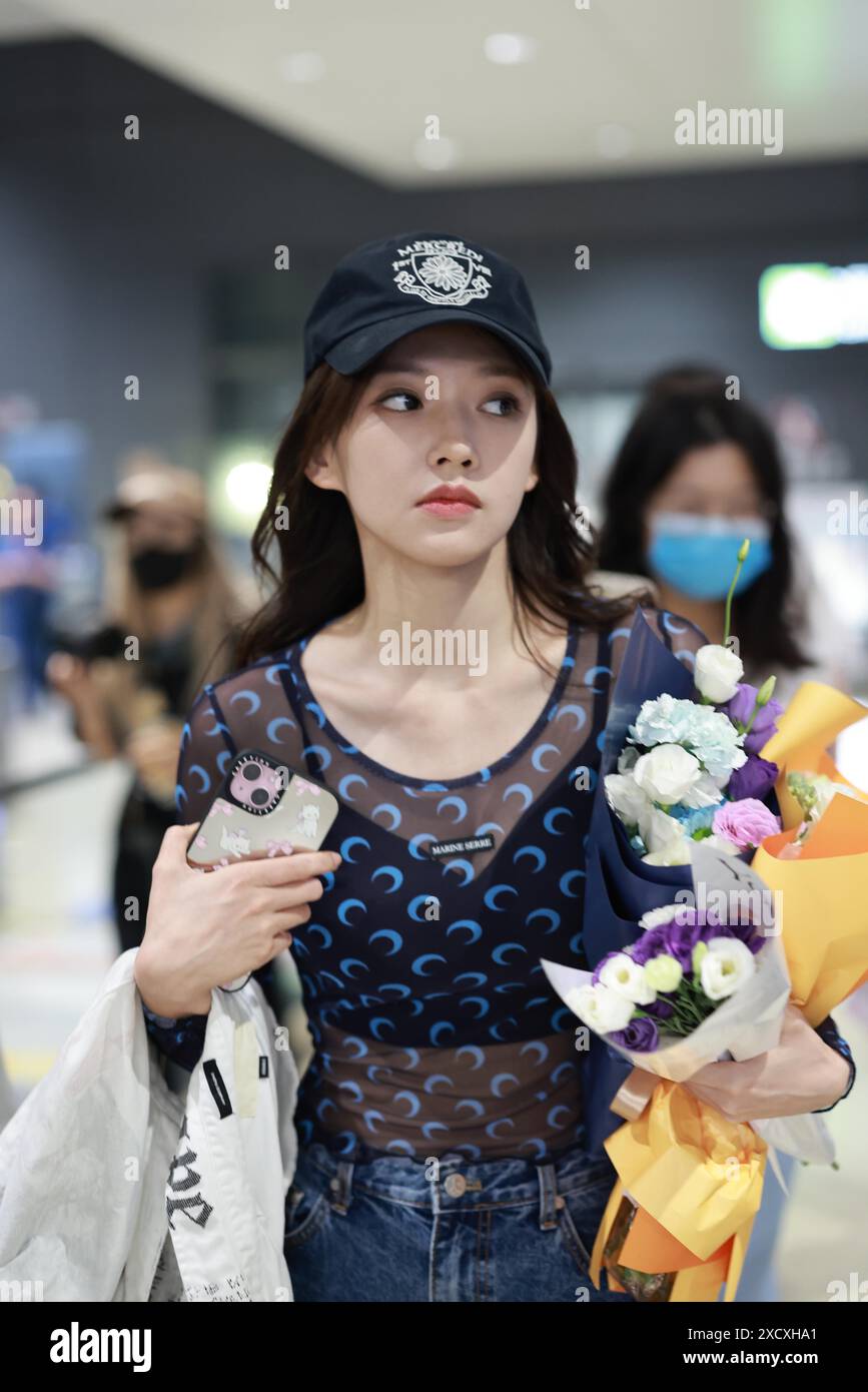 Chinese singer, dancer and actress Cheng Xiao appears at the airport in ...