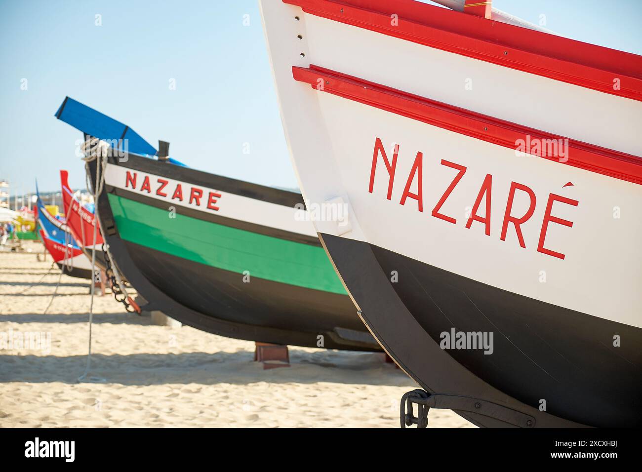 Fishing boats on the beach at Nazare, Portugal Stock Photo - Alamy