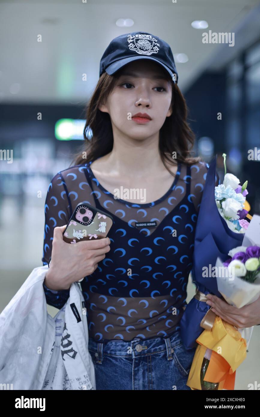Chinese singer, dancer and actress Cheng Xiao appears at the airport in ...