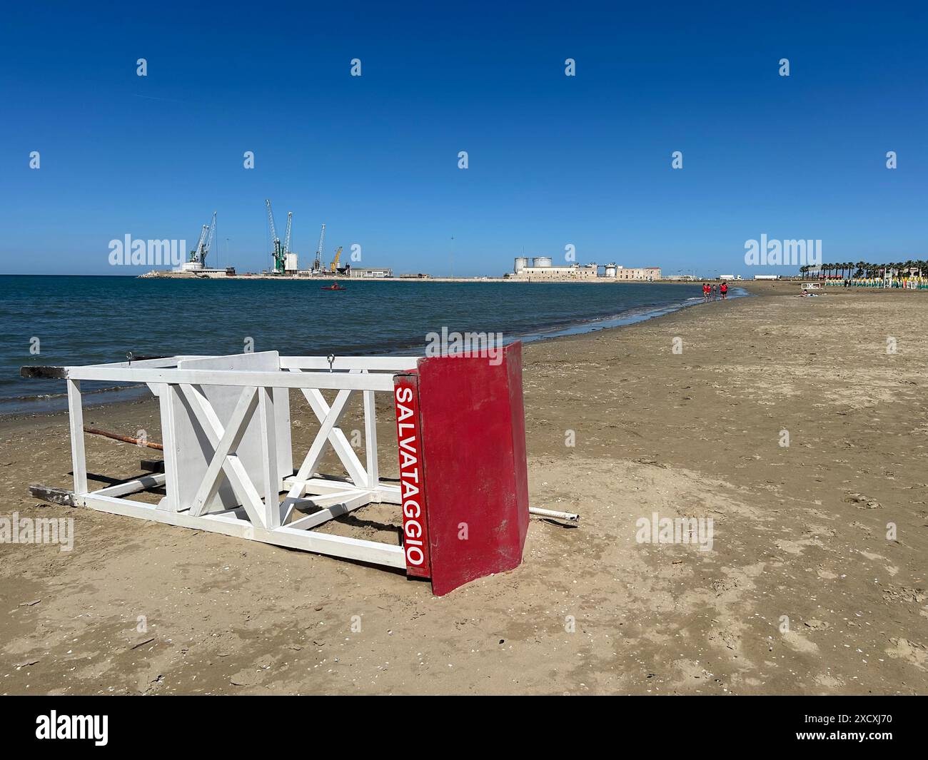 23 May 2024, Italy, Bartella: The toppled tower of a lifeguard on an ...